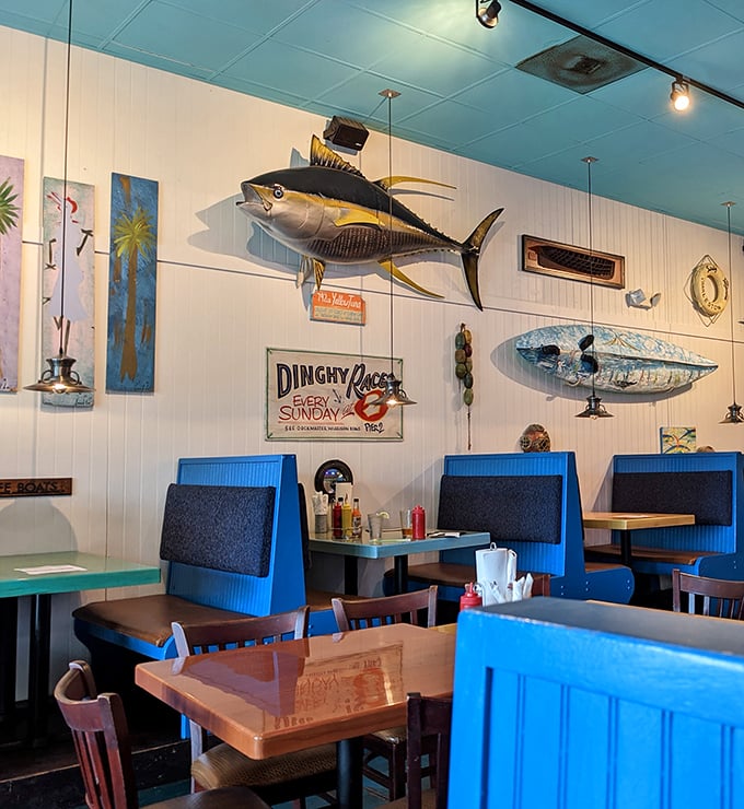 Mounted fish watch over diners from white beadboard walls – silent witnesses to countless "best burger I've ever had" declarations.