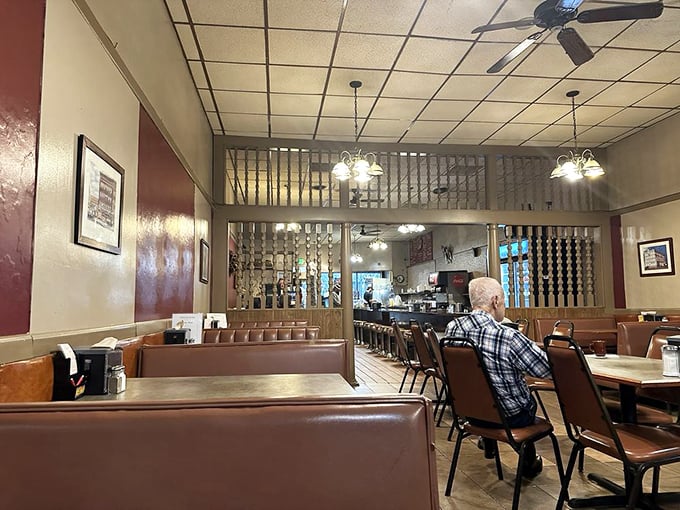 The dining room's dividers create little neighborhoods within the restaurant, where conversations stay private but the community feeling remains.