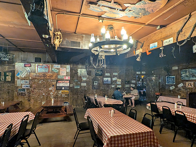 The dining room feels less like a restaurant and more like your coolest relative's cabin—if that relative happened to collect every piece of Americana ever made.