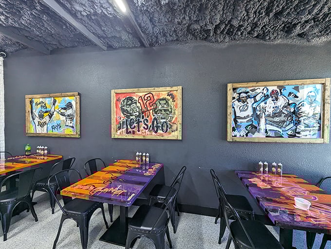 Sports-themed art watches over diners like barbecue guardian angels. These tables have witnessed countless "first bite" faces—the universal expression of BBQ bliss.