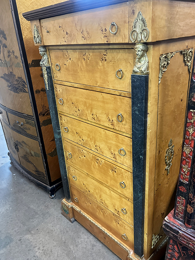 This isn't just a dresser—it's a time machine crafted from burl wood and brass that whispers tales of grand estates.