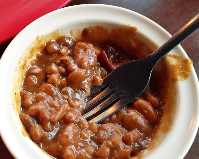 These baked beans have clearly been introduced to the brisket family, absorbing smoky wisdom and becoming something far greater than the sum of their parts.