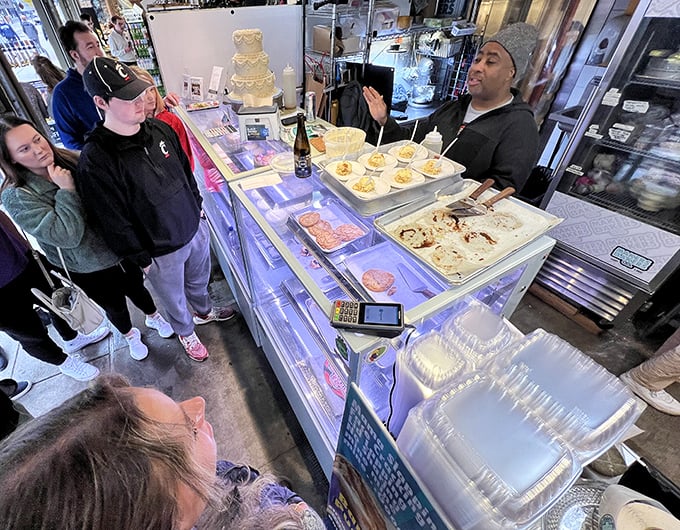 The bakery counter experience: where decisions are difficult, anticipation builds, and strangers become united in dessert appreciation.