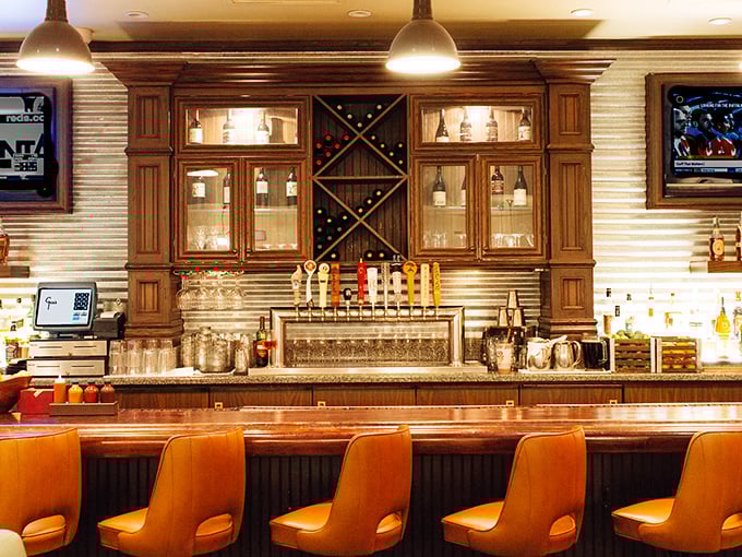 The bar at Gus's isn't just about drinks – it's a front-row seat to craftsmanship, where bourbon and barbecue form a perfect union.
