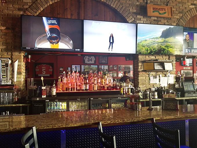 The bar area – where strangers become friends over cold drinks and hot pizza. Chicago sports memorabilia watches over patrons like old friends.