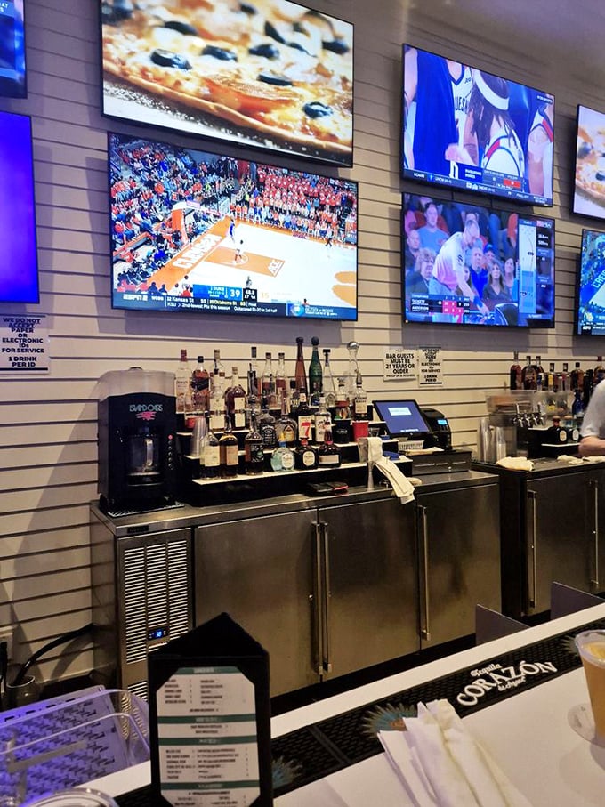 The bar at Shunk Gulley – where sports fans and cocktail enthusiasts find common ground. Those TVs aren't the only things with good reception.