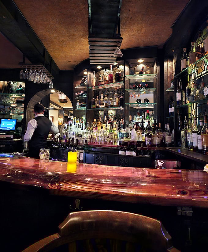 The bar at Sperry's: where bourbon meets craftsmanship and strangers become friends over perfectly chilled martinis and shared stories.