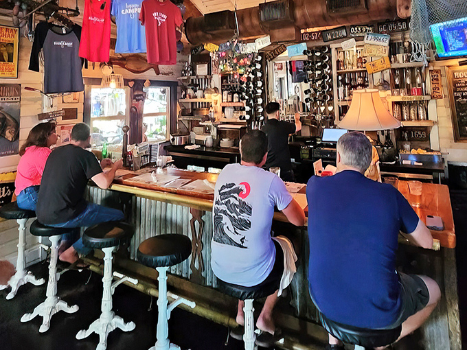 The bar at Owen's – where locals perch like seabirds and visitors quickly learn why this place has a line out the door.