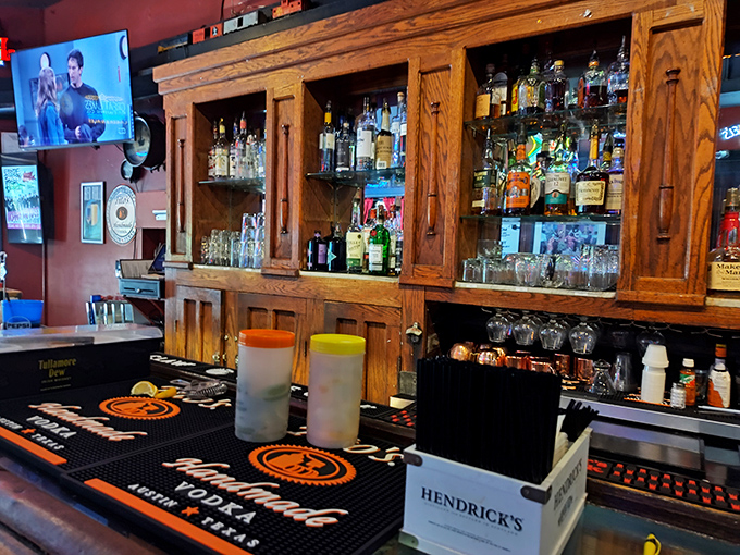 The bar at Oregon Express isn't just stocked—it's curated, with bottles standing at attention like soldiers ready to serve the cause of celebration.
