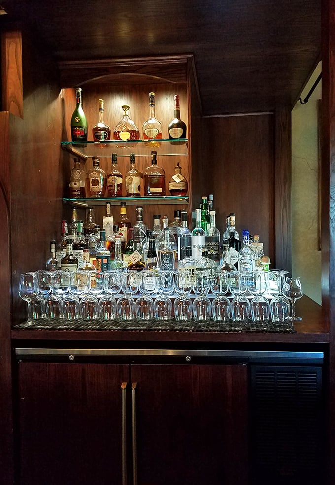 This isn't just a bar display—it's an adult candy store where the bottles gleam like jewels and promise sophisticated pleasures for discerning palates.