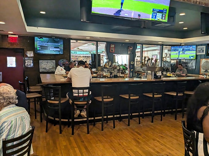 Where sports on TV and spirits behind the bar create the perfect backdrop for post-chicken relaxation. The curved bar invites conversation.
