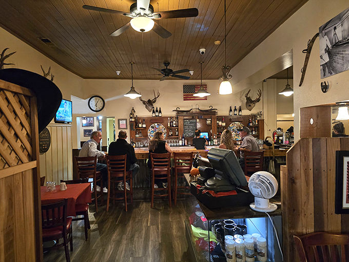The bar area feels like the living room of California's ranching past—mounted antlers, wooden beams, and locals sharing stories.