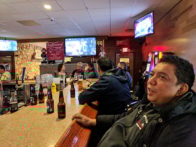 The bar area hums with the energy of a place where everybody might not know your name yet, but they're certainly willing to learn it.