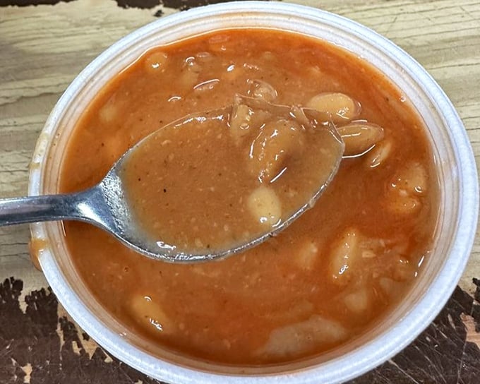 These aren't your average beans from a can—they're slow-simmered flavor bombs that have been taking notes from the nearby brisket.