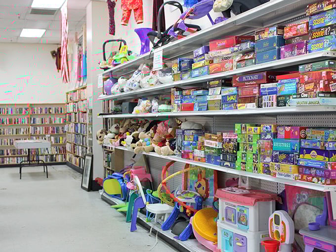 The toy section resembles a time capsule of childhood joy, where board games and stuffed animals await their second chance at playtime.
