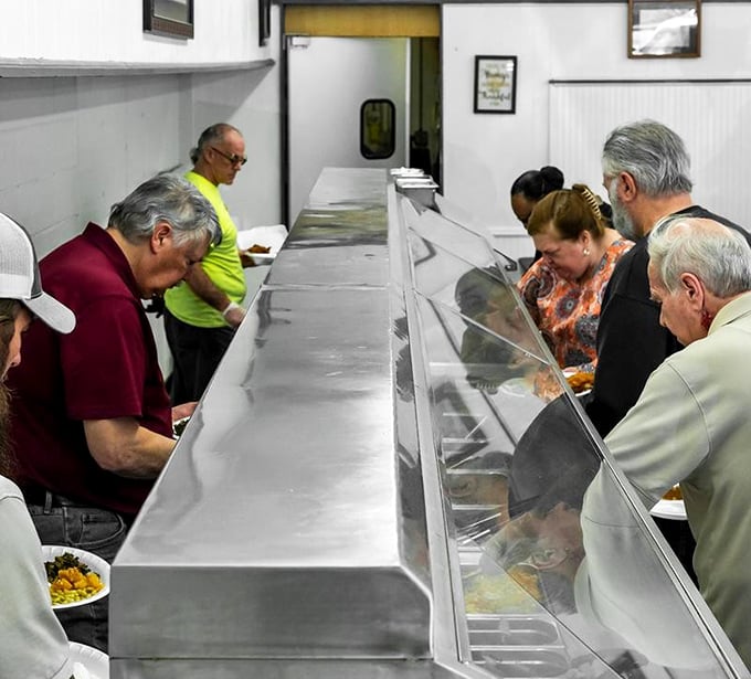 The buffet line—where decisions get serious and regulars strategize their plate real estate with military precision.