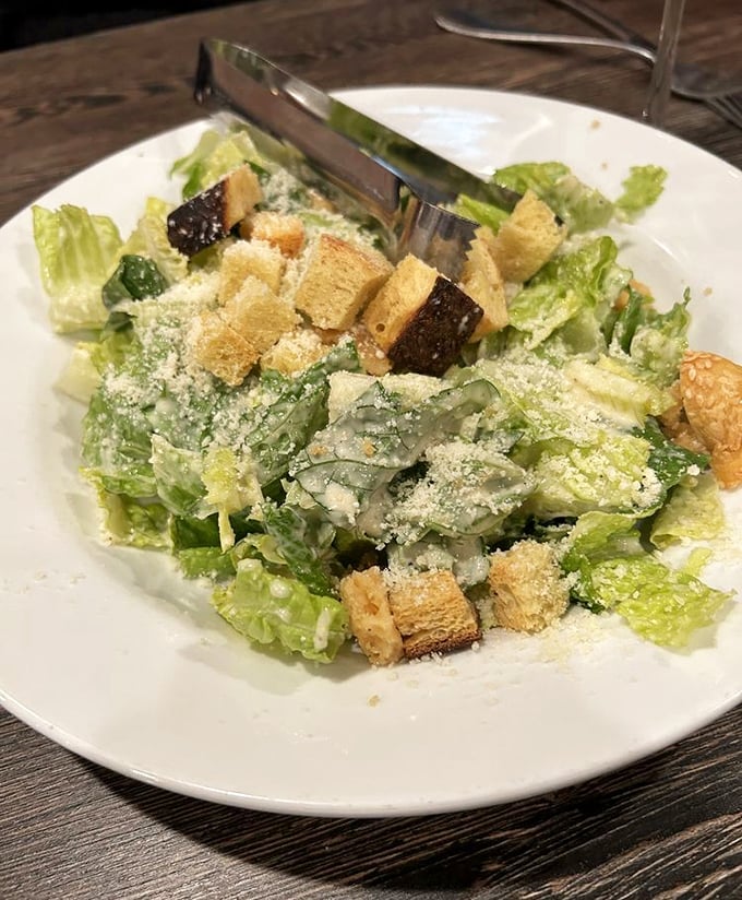 Caesar salad that Julius himself would approve – fresh, crisp, and properly dressed.