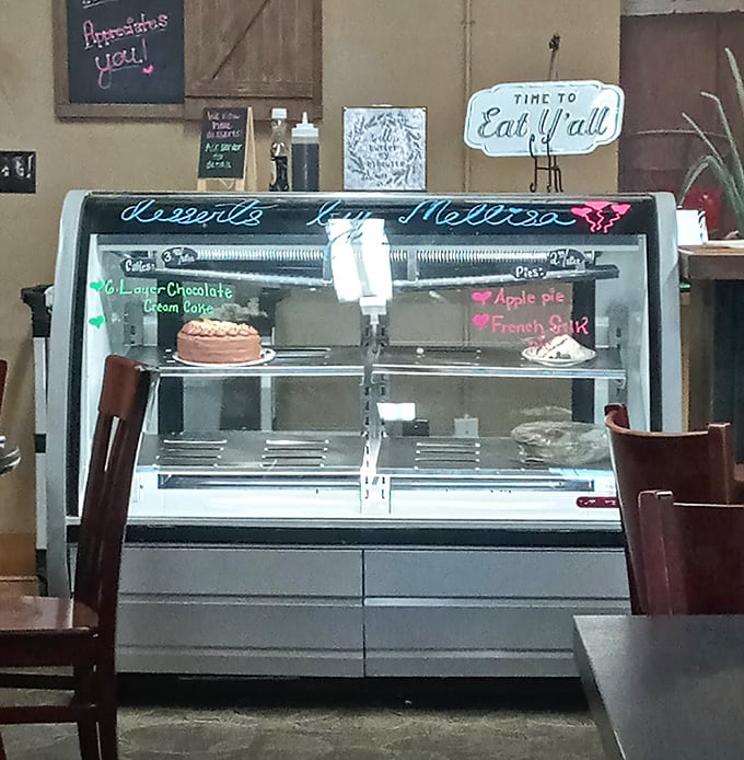 A dessert case that makes willpower crumble faster than the crust on that apple pie. Resistance is futile, just embrace the inevitable.