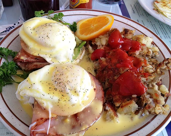 Benedict with a California twist – poached eggs perched atop Canadian bacon, draped in hollandaise and accessorized with fresh tomatoes.
