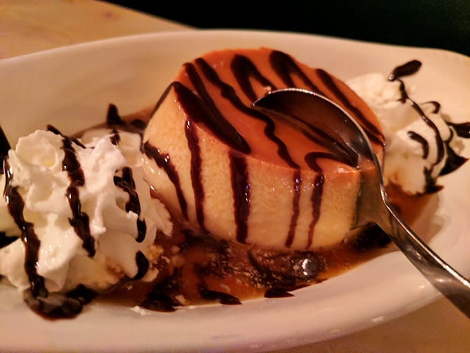 Flan that jiggles just right – the dessert equivalent of a perfect tango, with chocolate sauce playing the passionate dance partner.