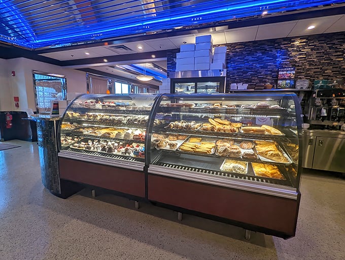 A pastry case that should come with a warning label: "Caution: May cause spontaneous happiness and the immediate abandonment of diet plans."
