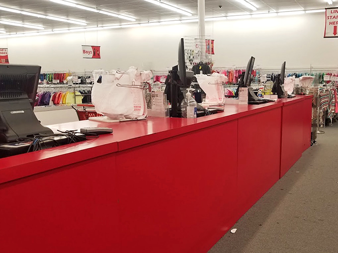 The bright red checkout counter stands ready to tally up your treasures without inducing buyer's remorse.