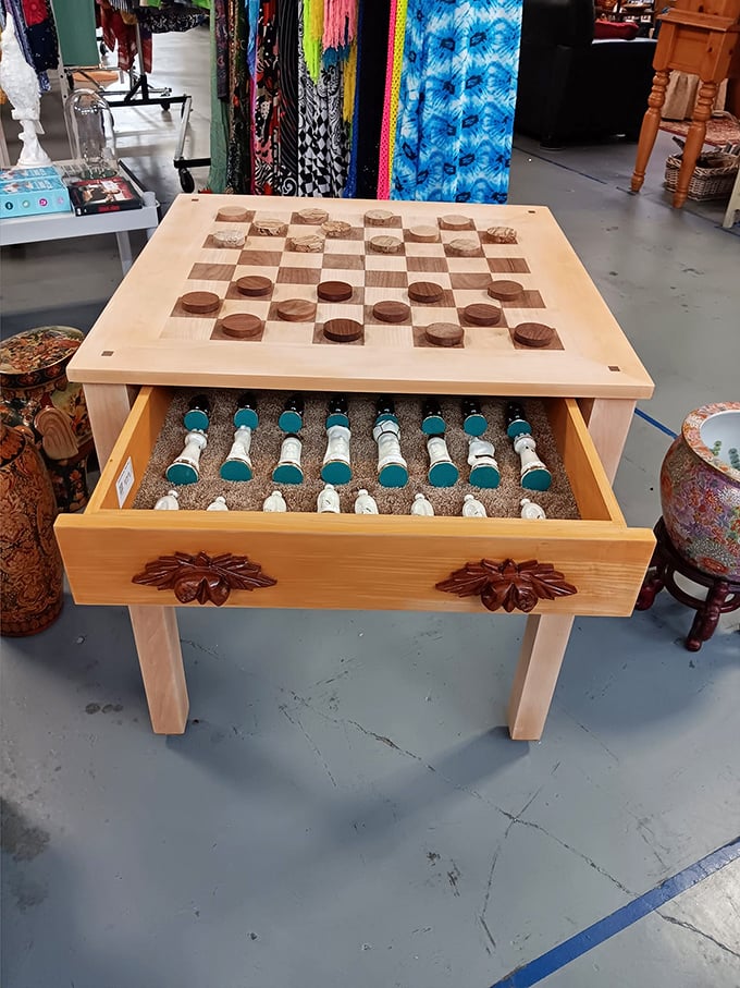 This chess/checkers table isn't just furniture—it's an invitation to unplug, look your opponent in the eye, and declare "King me!"
