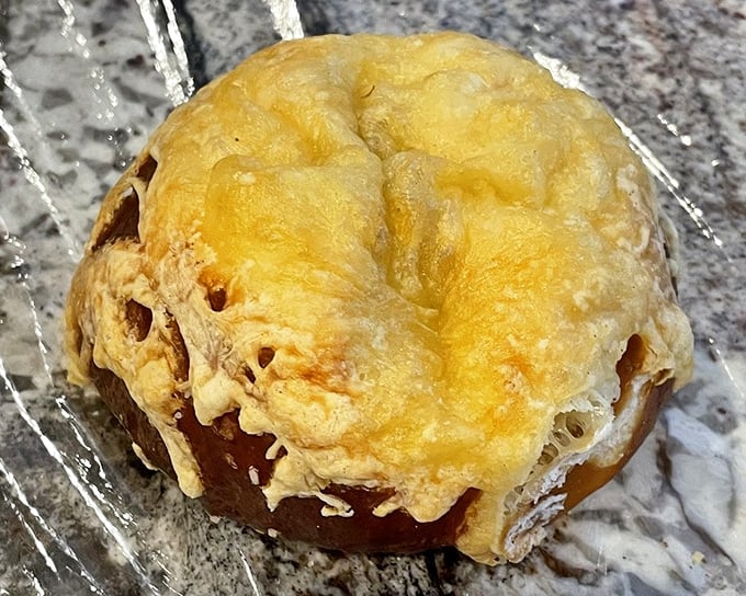 Cheese melted atop a pretzel roll creates the ultimate comfort food hybrid—like if Germany and Wisconsin had a delicious carb baby.