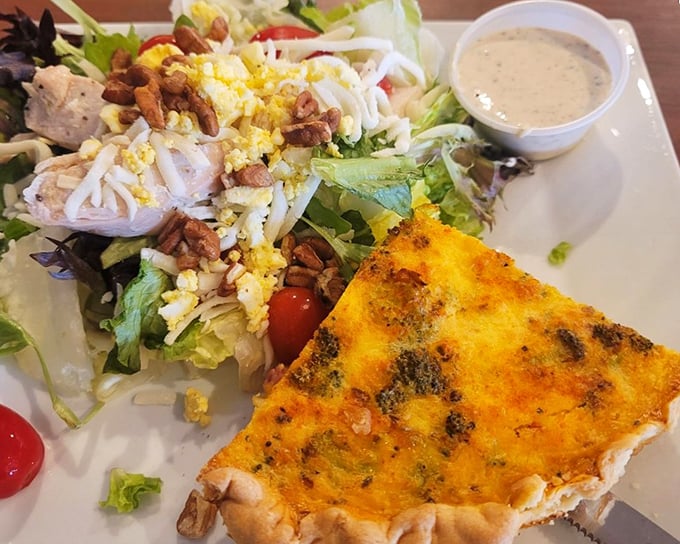A salad that proves healthy eating doesn't have to be punishment—it can be a celebration with pecans, chicken, and a quiche sidekick.