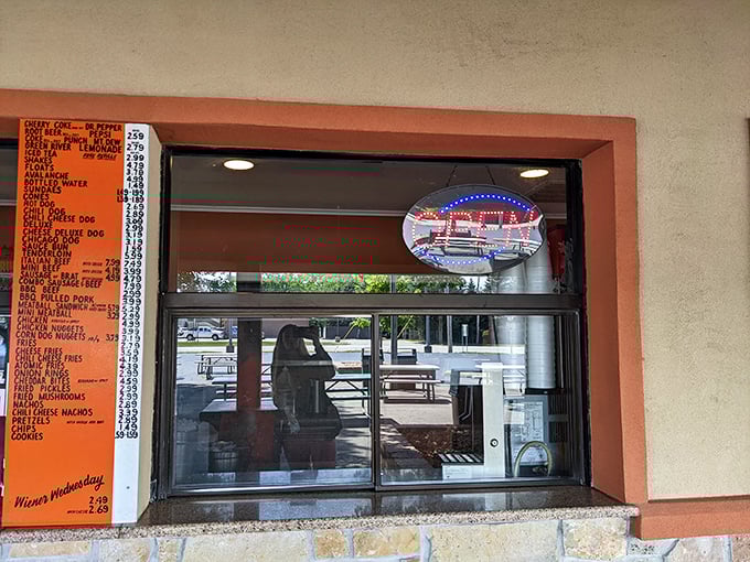 The ordering windows glow like beacons, promising delicious refuge from whatever the day has thrown your way.