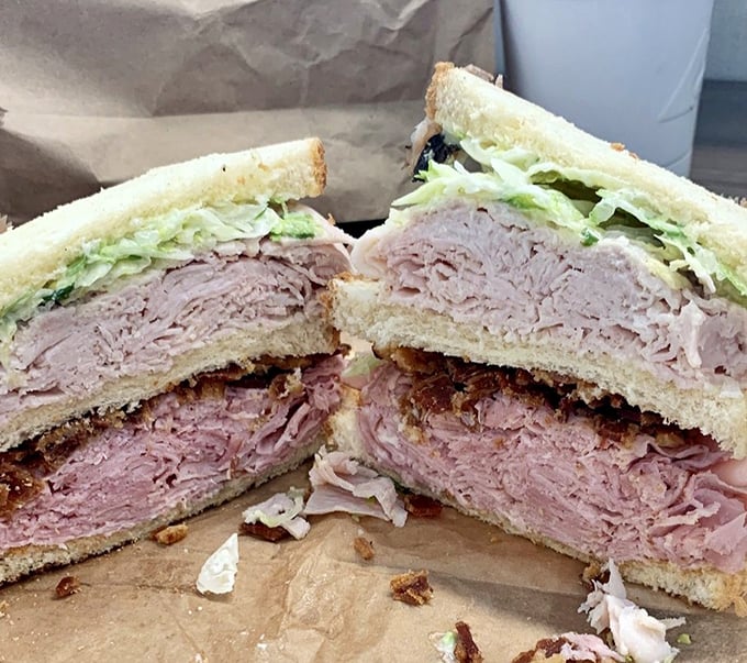 This club sandwich isn't playing around—it's the three-story mansion of lunch options with enough meat to feed a small family.