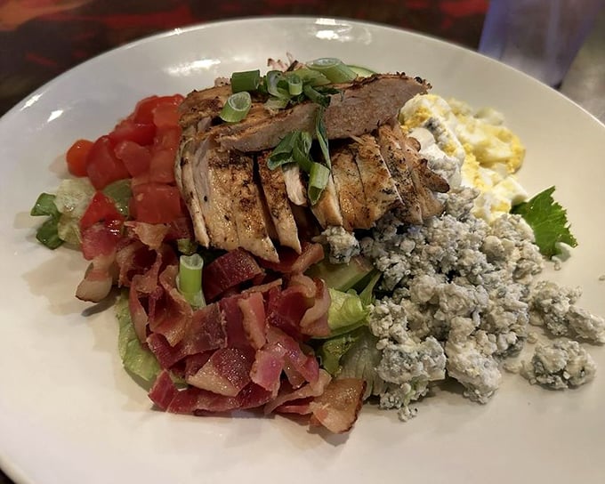 This Cobb salad has more carefully arranged sections than my retirement portfolio—and probably a better return on investment.