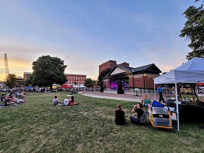 Community events in Perry Square bring neighbors together under summer skies. Free concerts: where the only cover charge is bringing your own lawn chair.