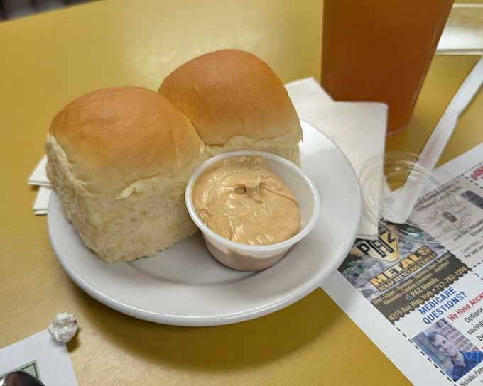Fresh-baked rolls that arrive at your table still warm enough to melt butter on contact—a dangerous start to any meal.