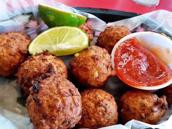 Conch fritters—little golden globes of Keys tradition that pop in your mouth like edible postcards saying "Wish you were here!"