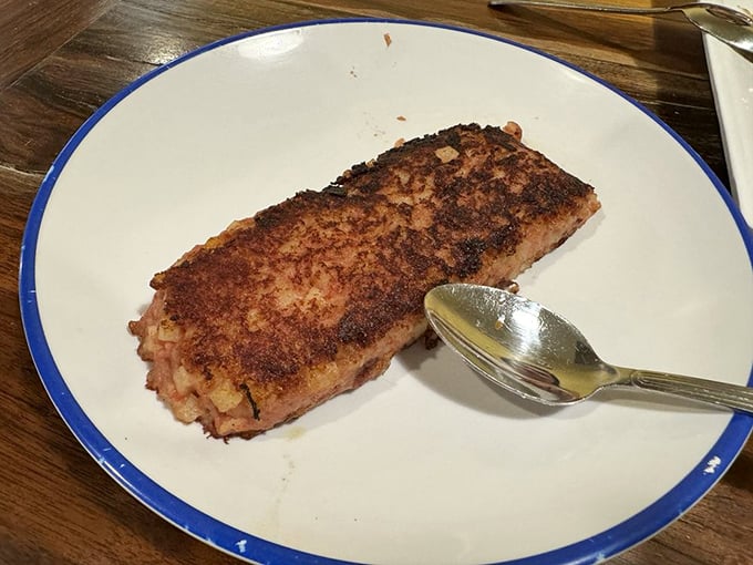 Corned beef hash that's been crisped to perfection. This isn't just breakfast—it's a religious experience with a fork.
