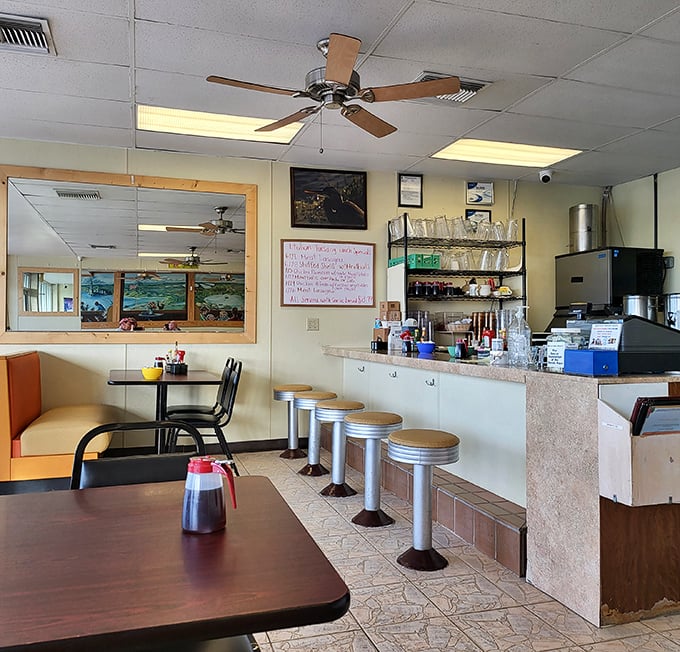 Classic diner counter seating—where solo diners become regulars and servers remember your coffee preferences after just one visit.
