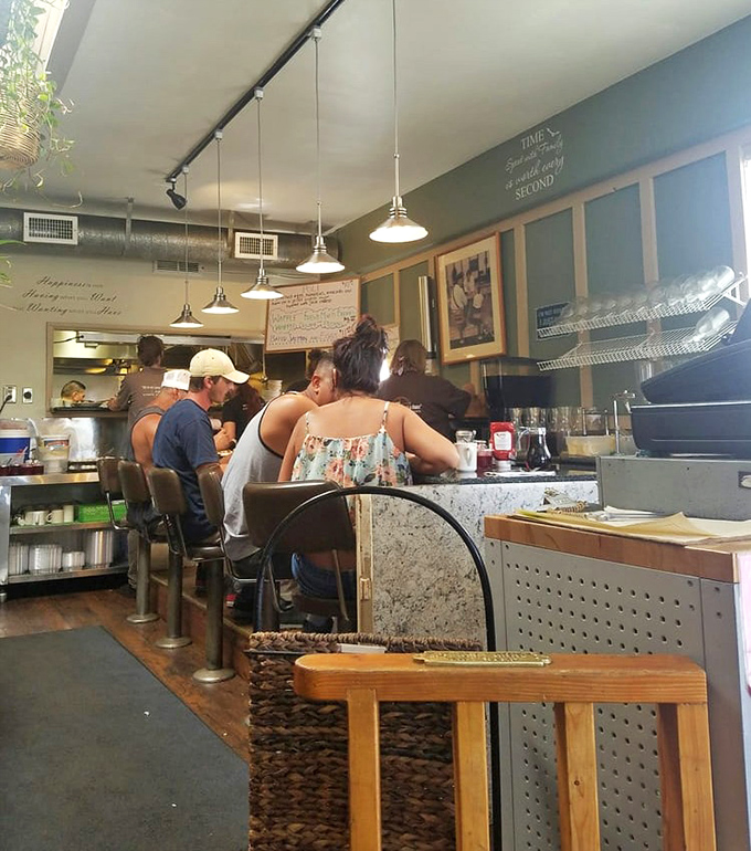 Where breakfast magic happens – the counter seats offer front-row tickets to the morning culinary show.