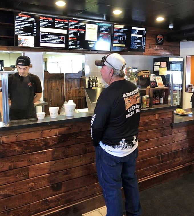 Where the magic happens – the ordering counter showcases the restaurant's rustic charm and no-nonsense approach to great food.