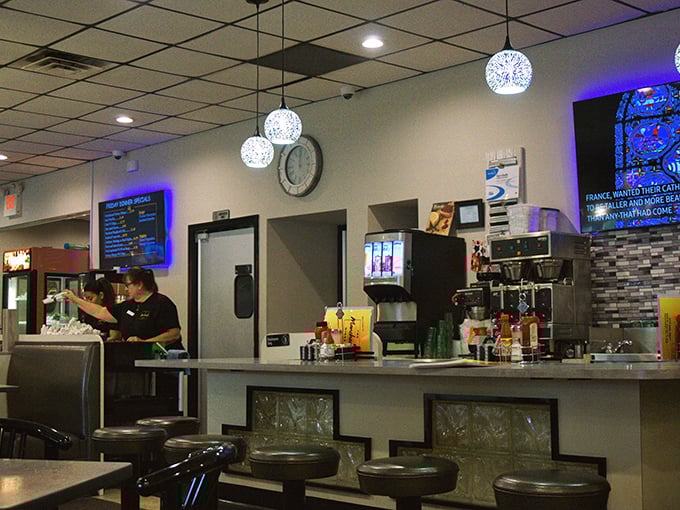 The counter area—where coffee flows freely, orders fly to the kitchen, and the rhythmic dance of diner service unfolds throughout the day.