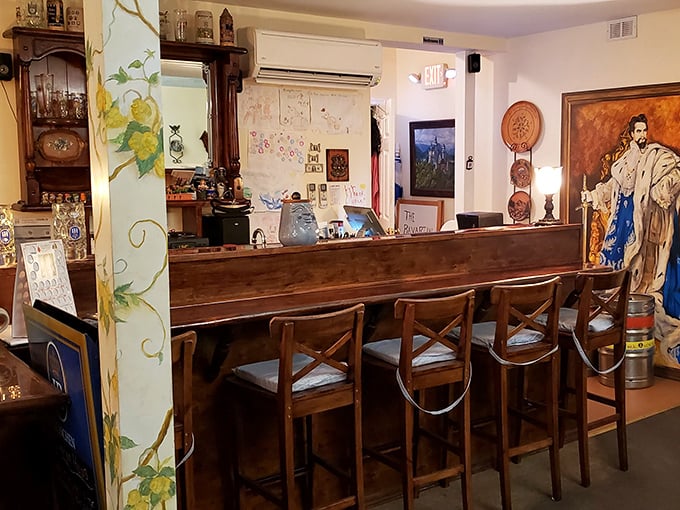 The bar area invites you to pull up a stool and stay awhile. Notice the hand-painted columns—little touches that show someone really cares.