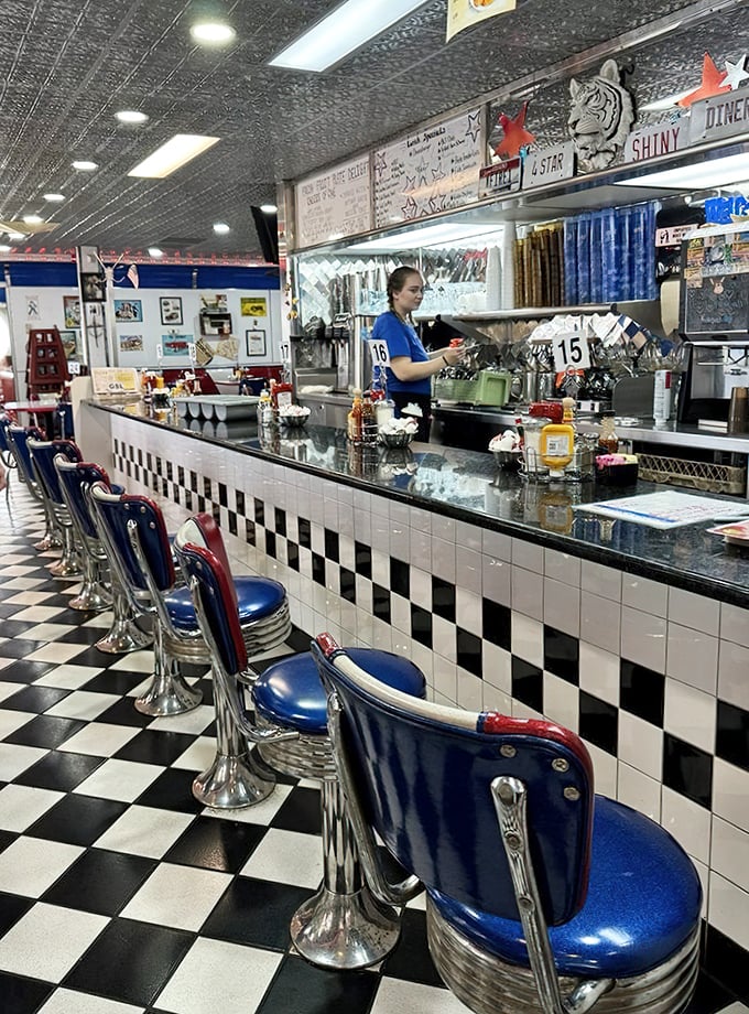 The counter isn't just where food is served—it's command central where coffee cups are never empty and everyone eventually learns your name.