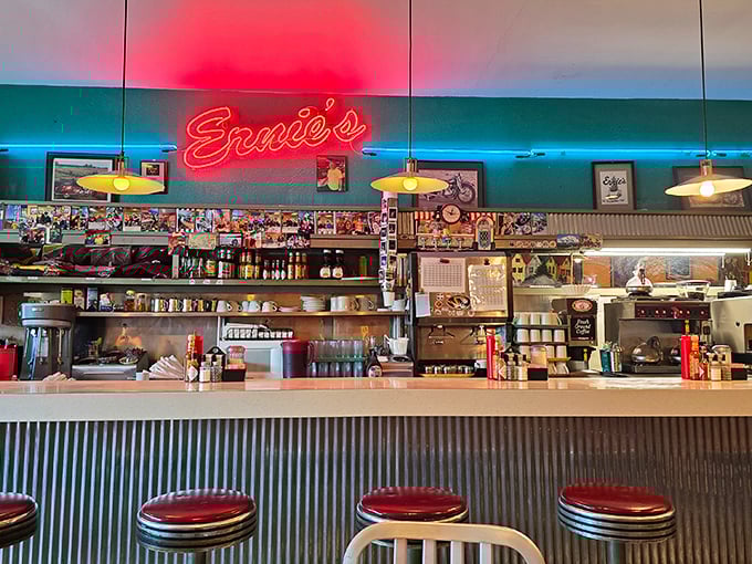 The iconic neon "Ernie's" sign glows like a beacon, promising refuge from chain restaurant mediocrity and a return to diner authenticity.