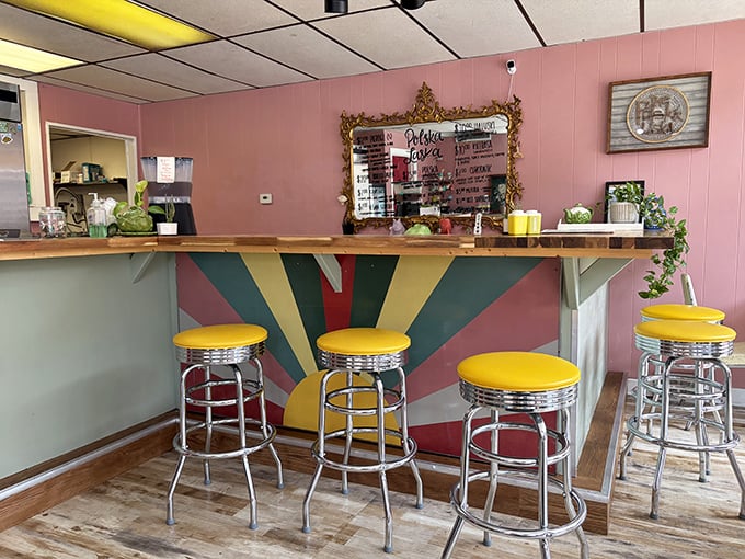 The counter's sunburst design radiates mid-century charm while yellow barstools invite you to perch and ponder pierogi possibilities.