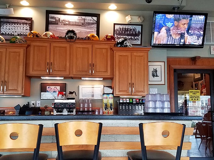 Sports memorabilia adorns the walls above the counter – this isn't corporate-mandated décor, it's community history on display.