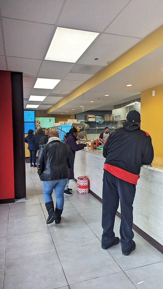 The line forms for a reason. These customers aren't just waiting for food—they're participating in a Baltimore ritual of patience rewarded.