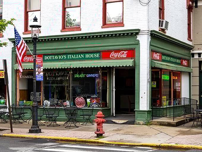 D'Ottavio's Italian House sits on the corner like your Italian grandmother—unassuming but ready to feed everyone who passes by. That Coca-Cola sign is practically vintage influencer marketing.
