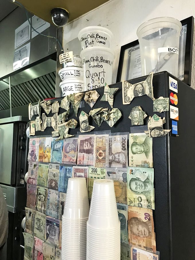 Money from around the world decorates this wall—proof that great barbecue transcends currency, language, and international borders.