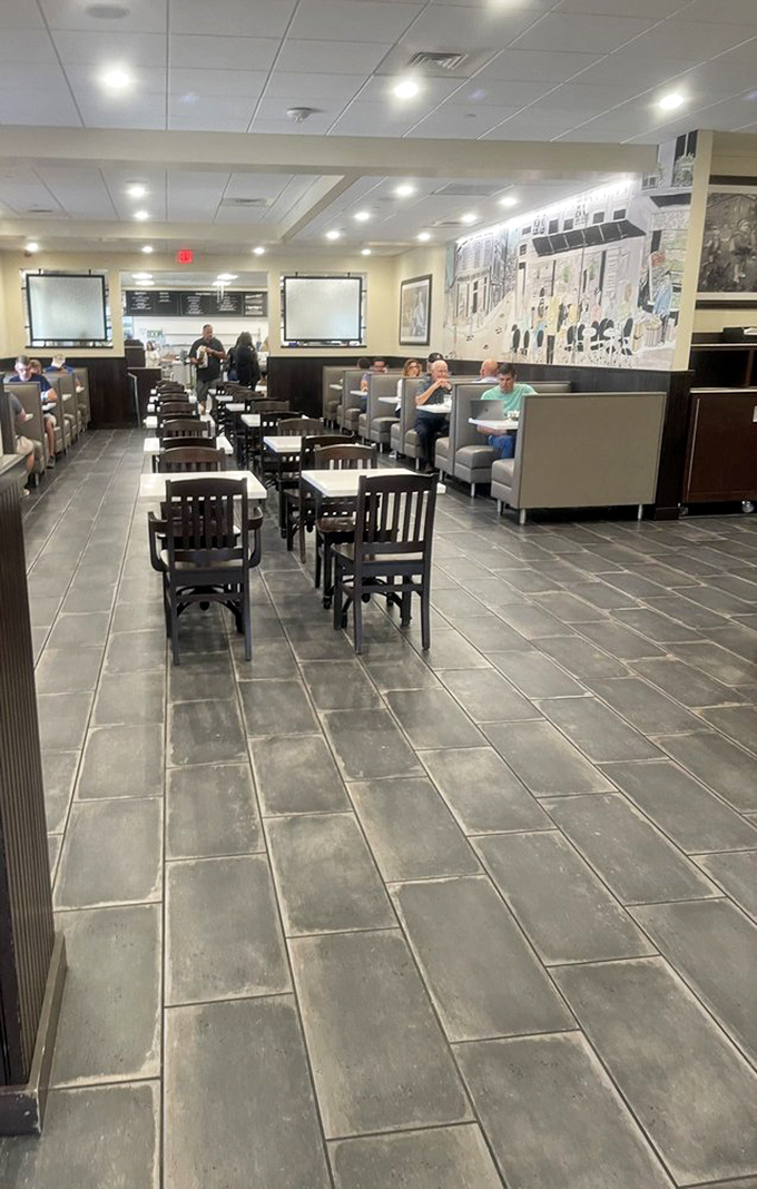 The dining room at Wright's—where strangers become friends united by the universal language of "mmmmm." Everyone's here for the same delicious reason.