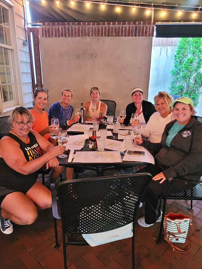Friends gathering on the patio, raising glasses to good times – the true essence of what makes Buckley's special.